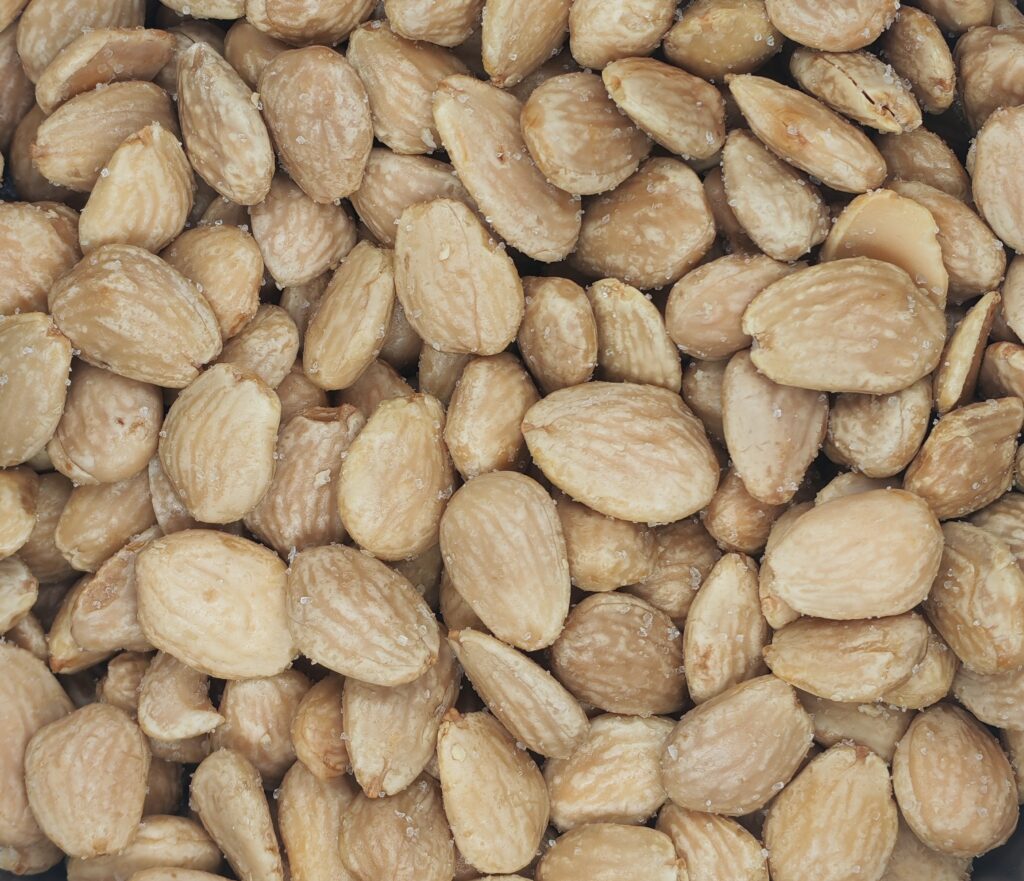 Salted extra virgin olive oil fried almonds skinless